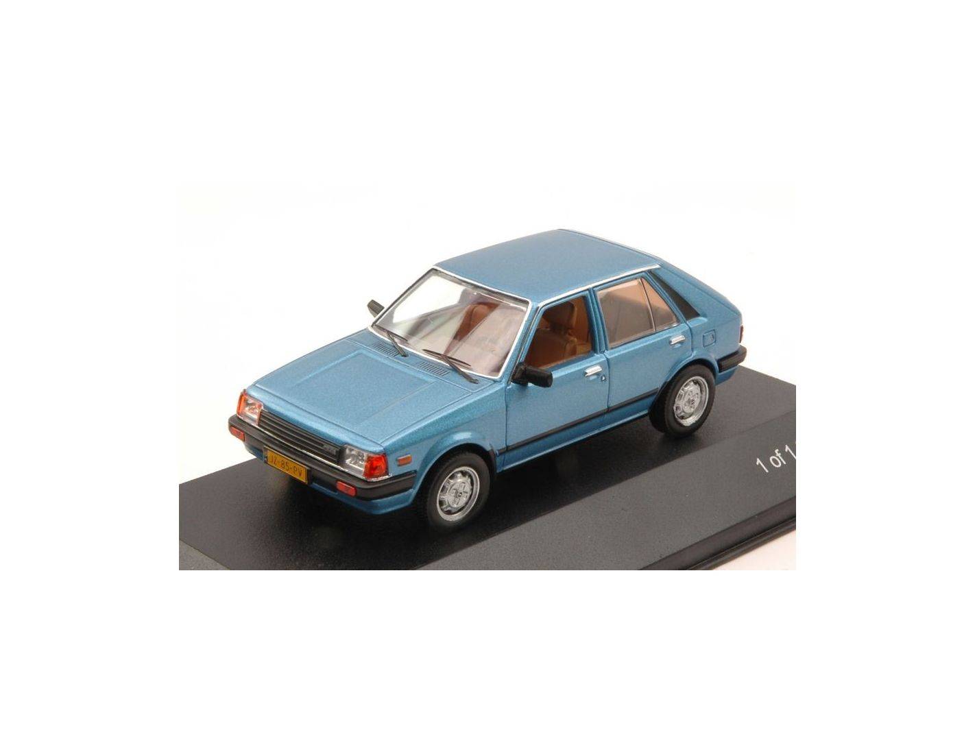 White Box WB209 MAZDA 323 HATCHBACK 1982 METALLIC BLUE 1:43 Modellino